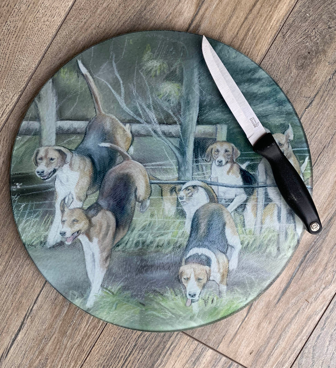 Hounds Jumping Round Worktop Saver – Grace Scott Art